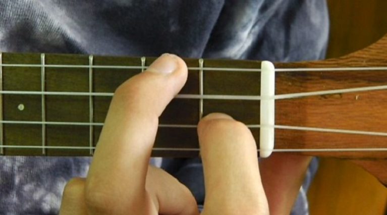 How to Play F Chord on Ukulele + 4 Easy Variations!